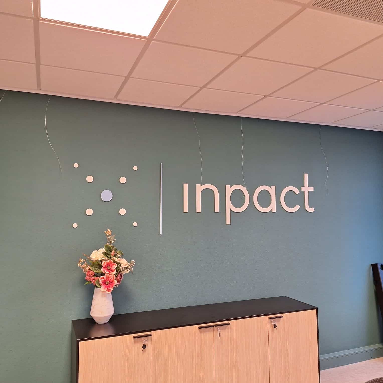 Inpact Solutions - Logo en letters